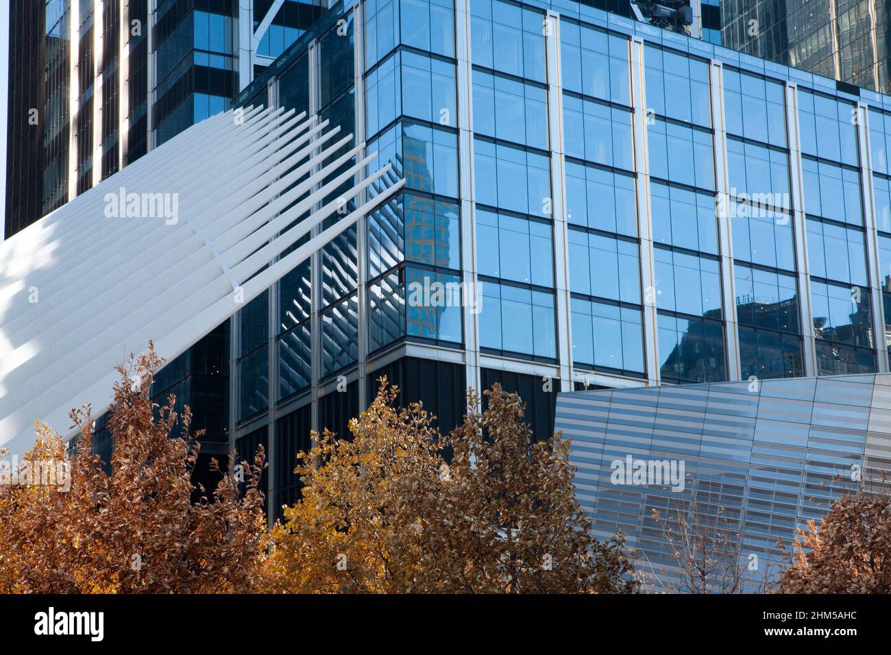 Partial Wing of Oculus Against office Building and Oak Trees, NY Stock ...