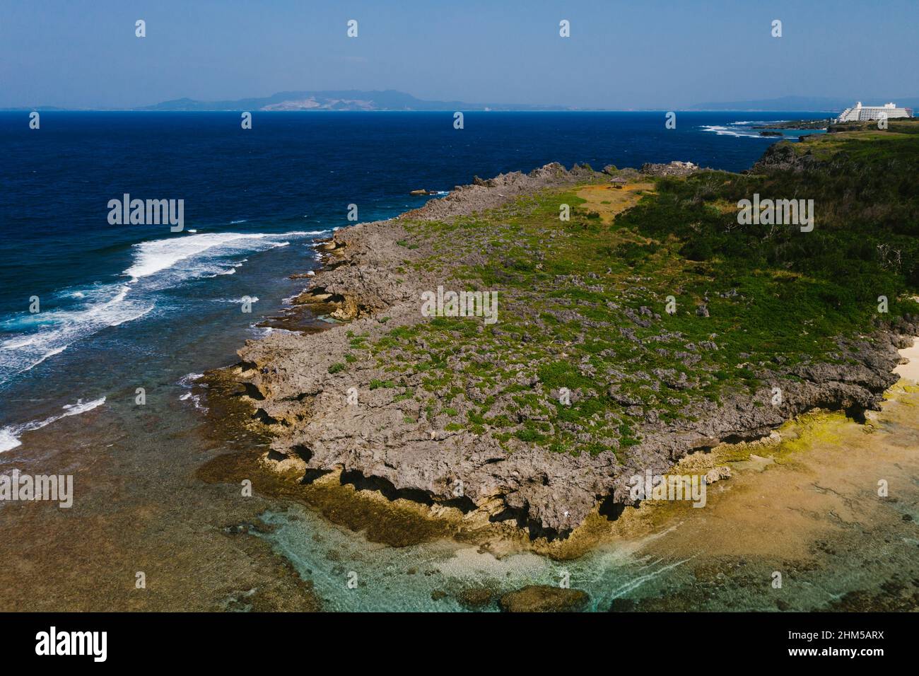 Peninsula off the coastline of a tropical island in the East China Sea ...