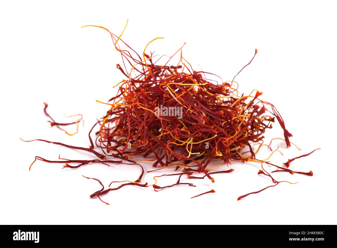 Saffron stigmas group isolated on white background Stock Photo - Alamy