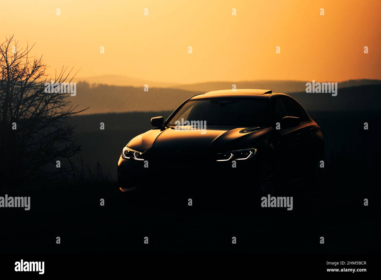 Modern car with nice background Stock Photo - Alamy