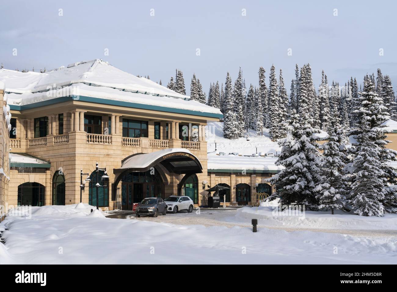 A view of a partially frozen Lake Louise in winter, Banff National Park ...