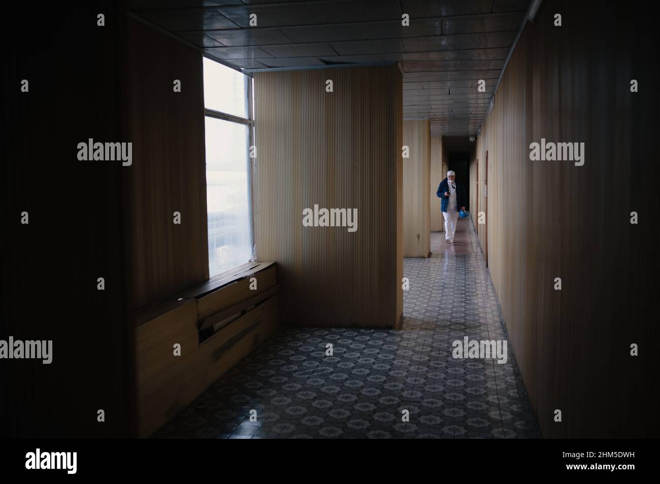 Staff inside the infamous Golden Corridor which leads from the ...