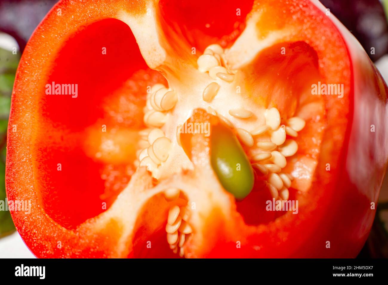 Red sweet pepper super macro. View inside. Bell pepper seeds close-up ...