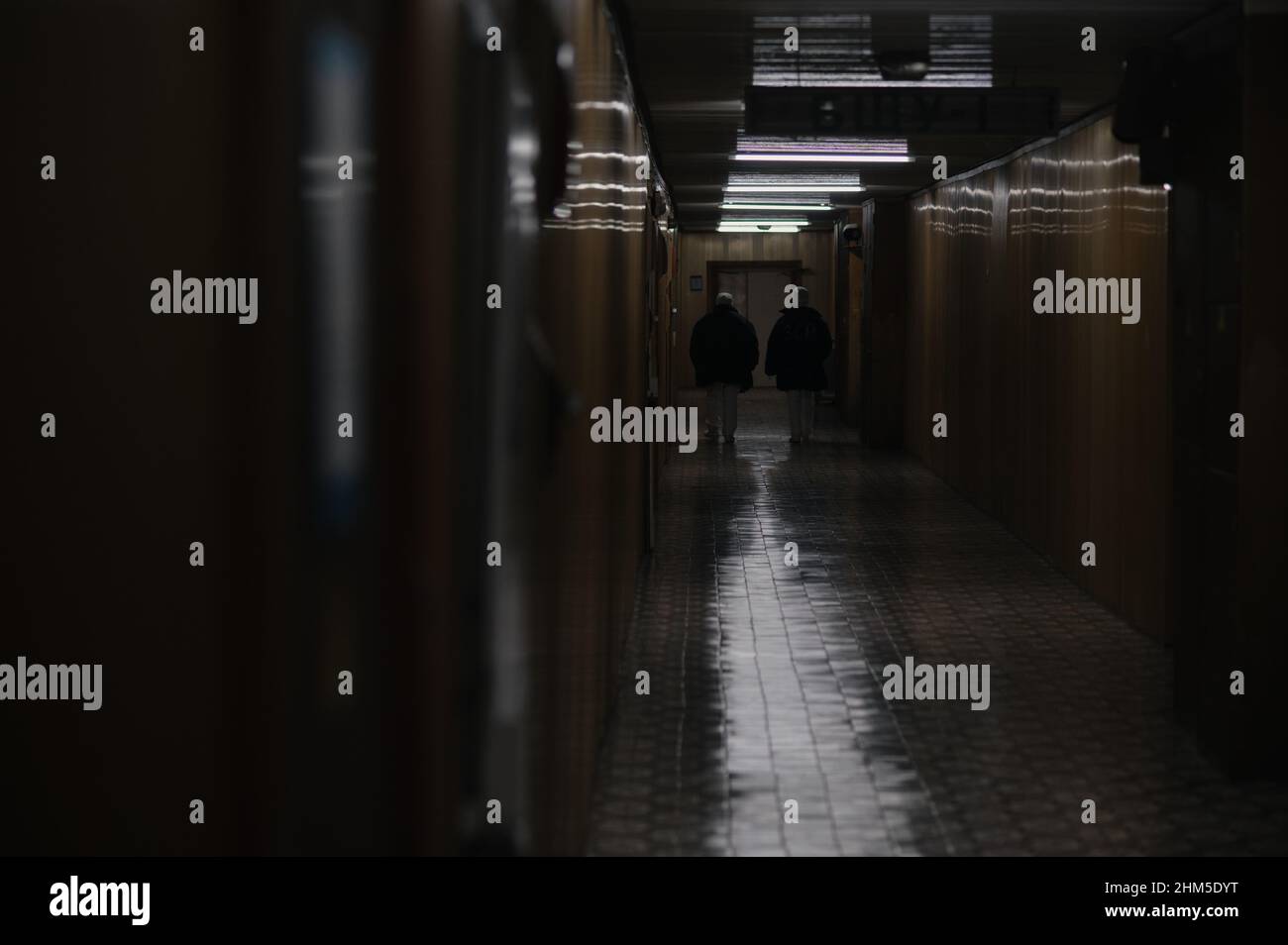 Staff inside the infamous Golden Corridor which leads from the ...