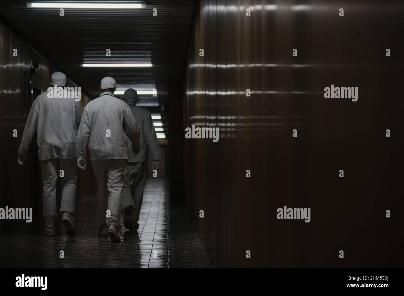 Staff inside the infamous Golden Corridor which leads from the ...