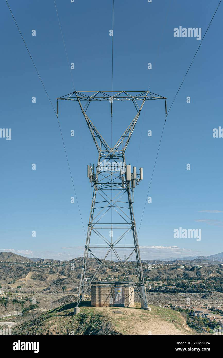 Vertical shot of the high voltage transmission tower under the clear ...