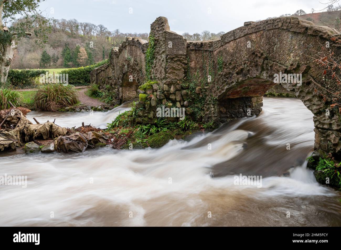 Long exposure of the river Avill flowing under Lovers bridge in the ...