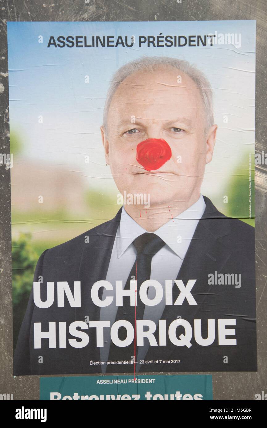 Torn posters of emmanuel macron hi-res stock photography and images - Alamy