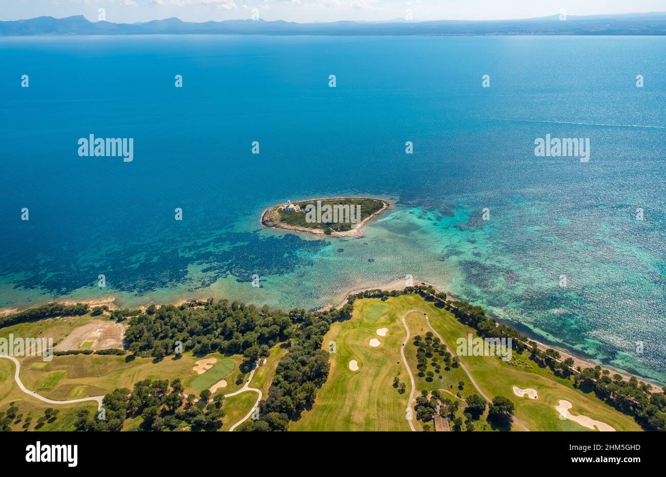 Aerial view, Club de Golf Alcanada, Alcanada Lighthouse island, in ...