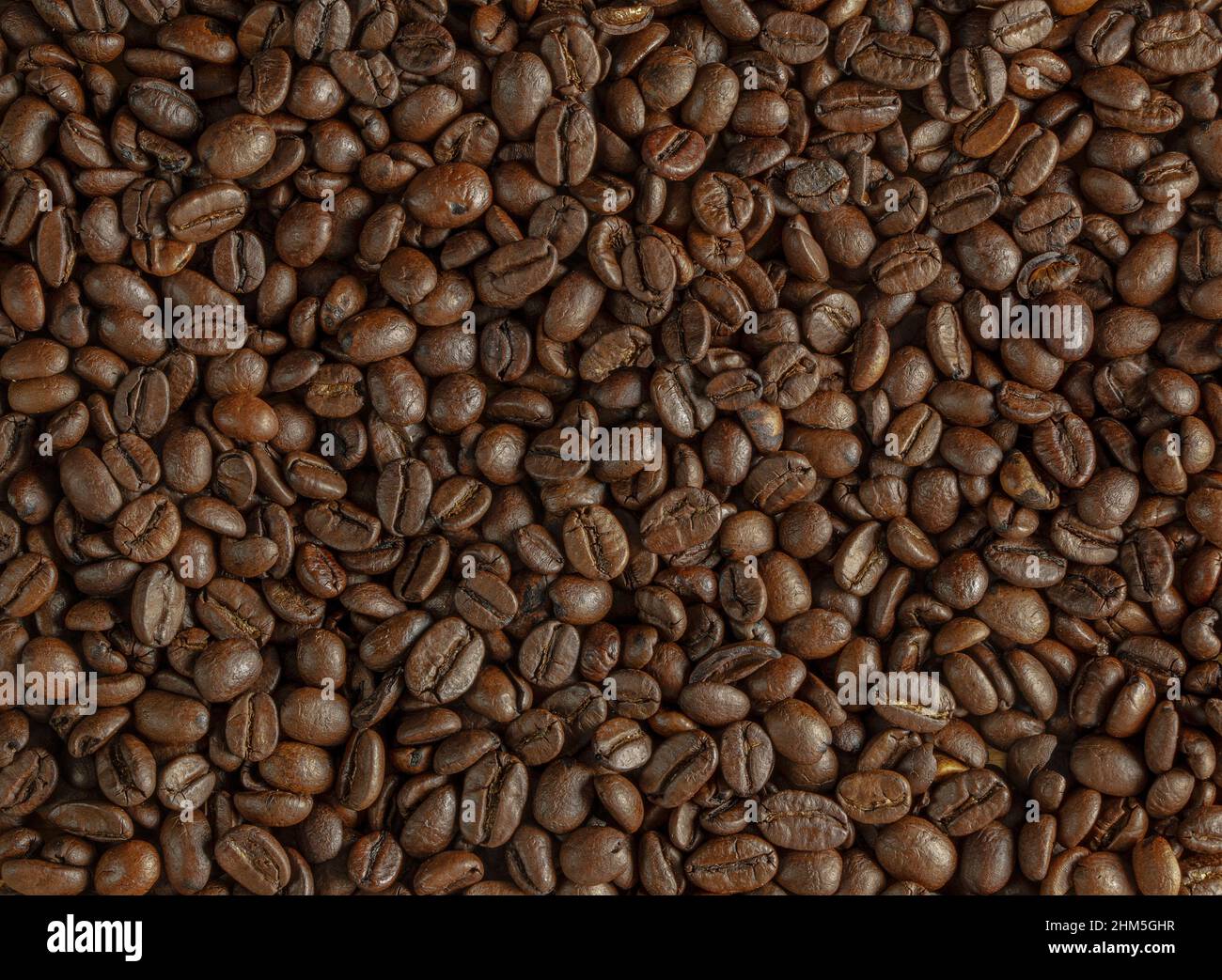 A blend of roasted Arabica and Robusta coffee beans background. ?offee ...