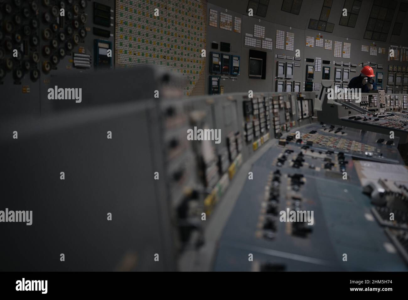 A tourist photographs control room 3 in the Chernobyl Nuclear Power ...