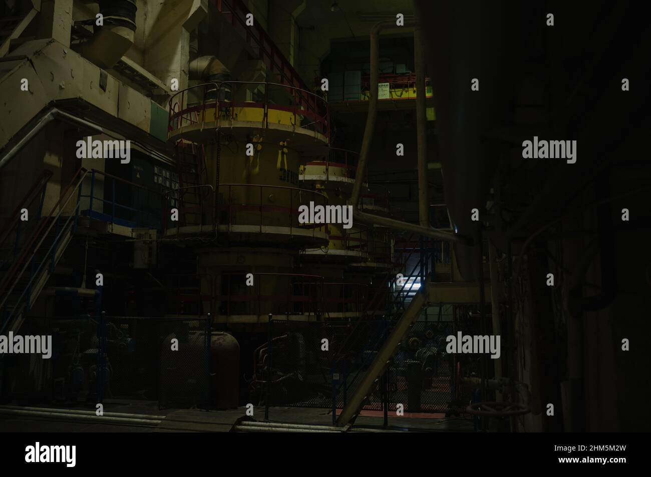Decommissioned equipment in the shadowy pump room of reactor 3 at the ...