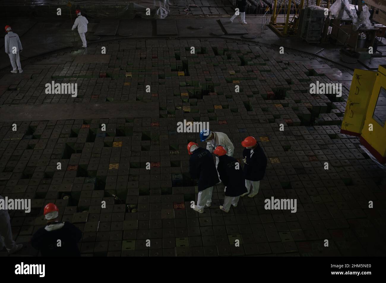 Tourists stand on the biological shield of reactor 3 at the Chernobyl ...
