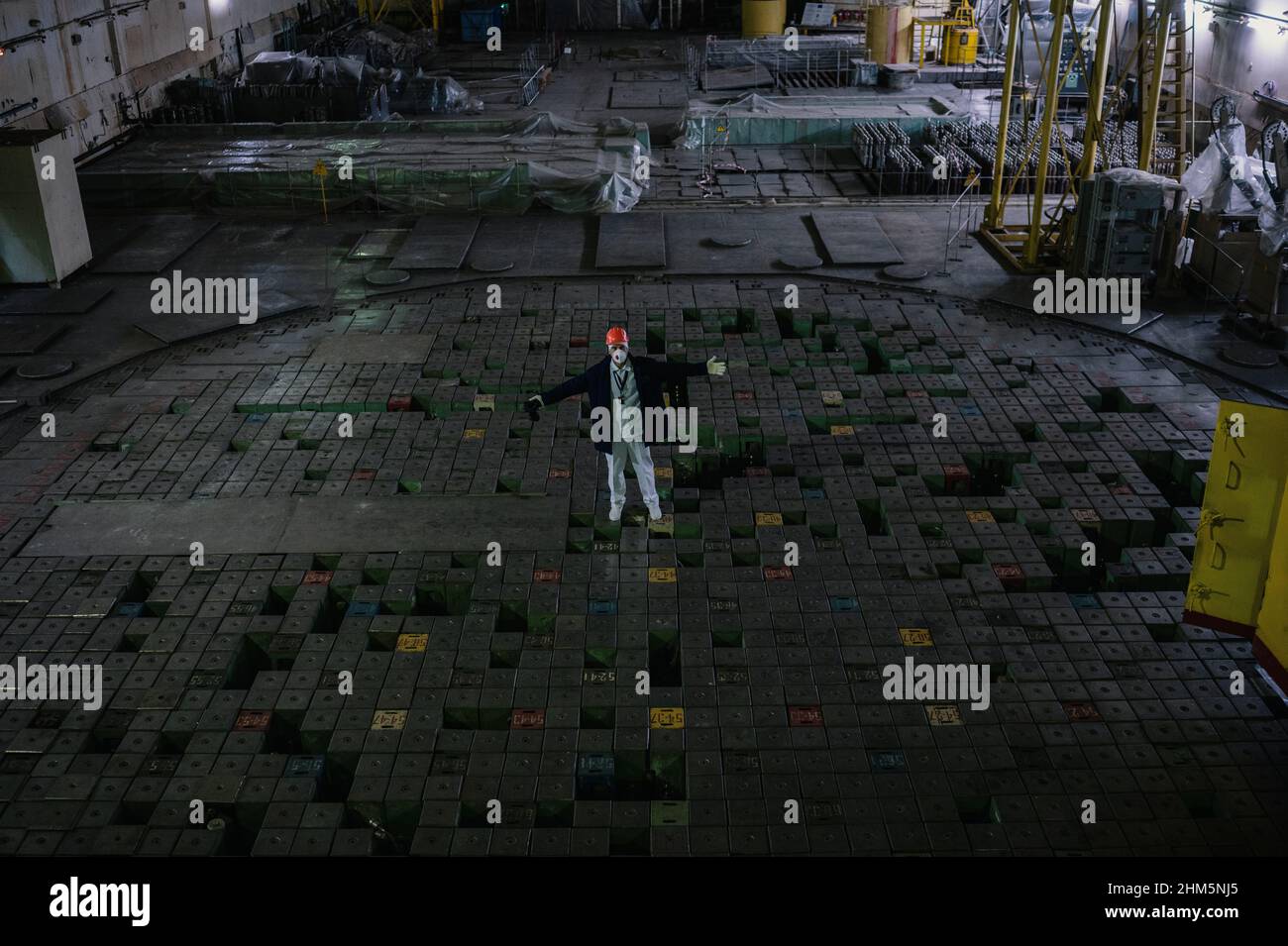 A tourist stands on the biological shield of reactor 3 at the Chernobyl ...