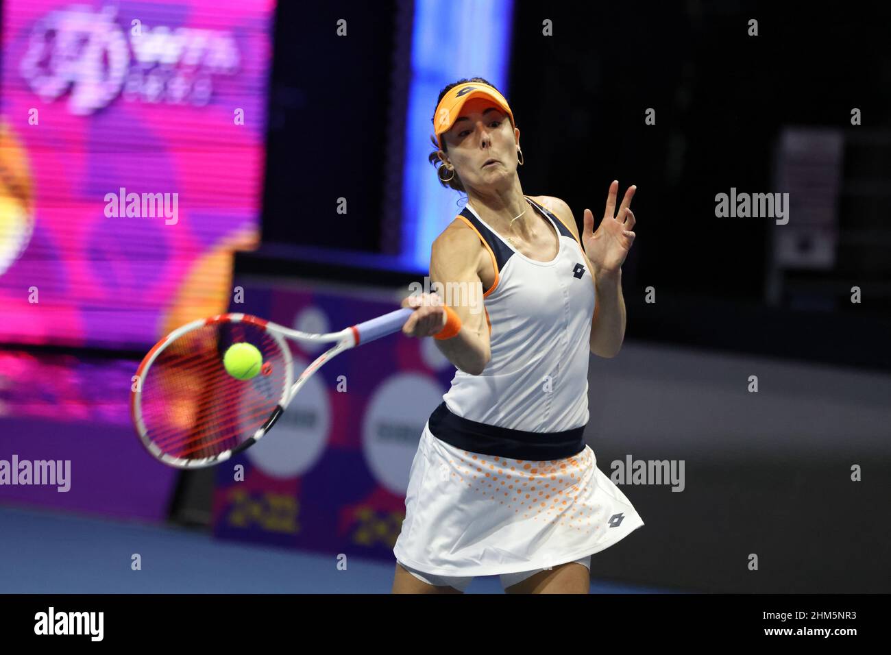 Alize Cornet of France plays against Elise Mertens of Belgium during ...