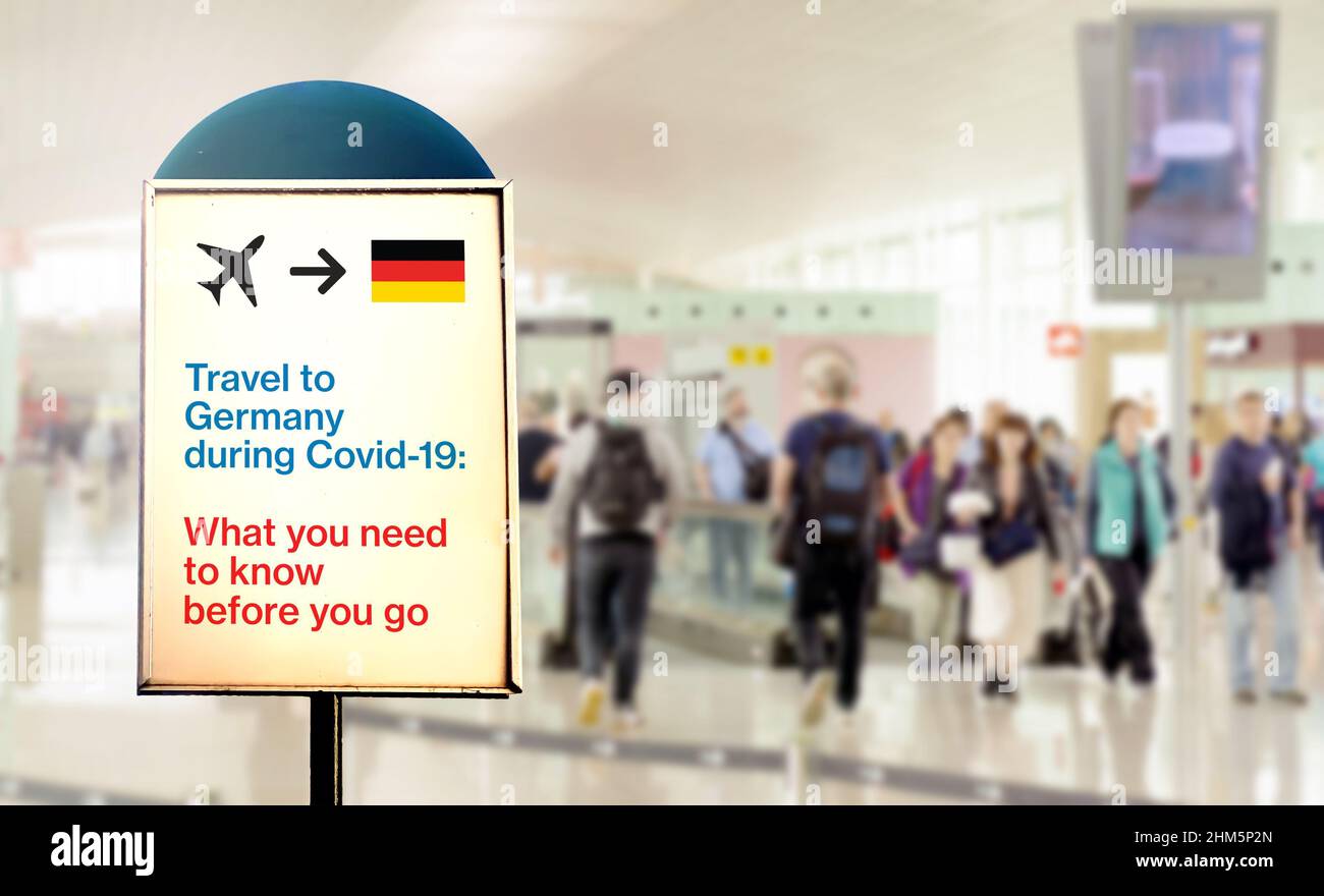 a signal inside an airport that warns about what to know before flying ...