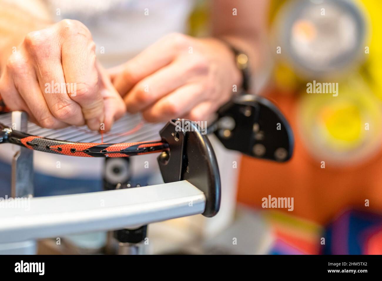 badminton racket repair and weaving Stock Photo - Alamy