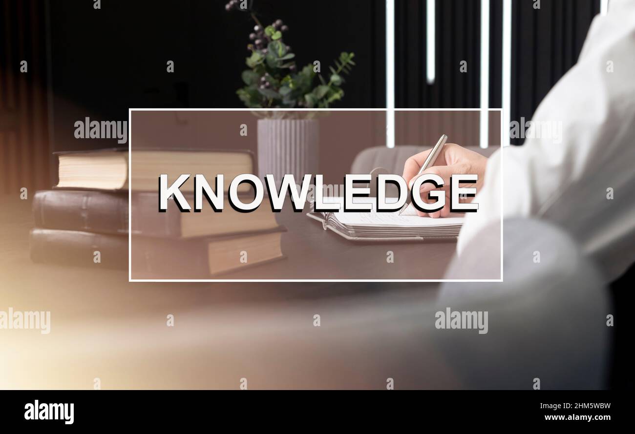 Knowledge word on business photo with books Stock Photo - Alamy