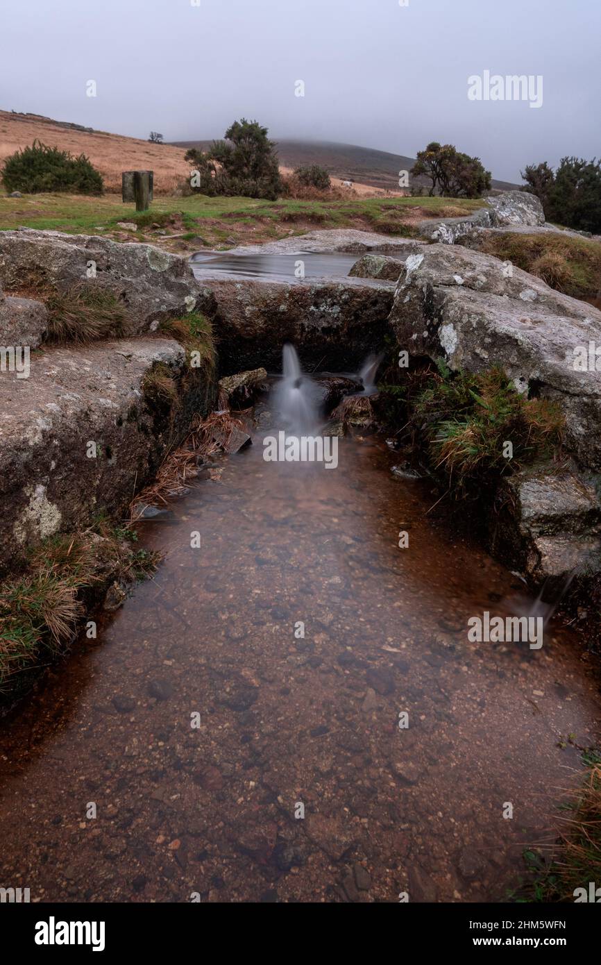 A Bullseye stone in the Grimstone and Sortridge Leat on Dartmoor, for ...