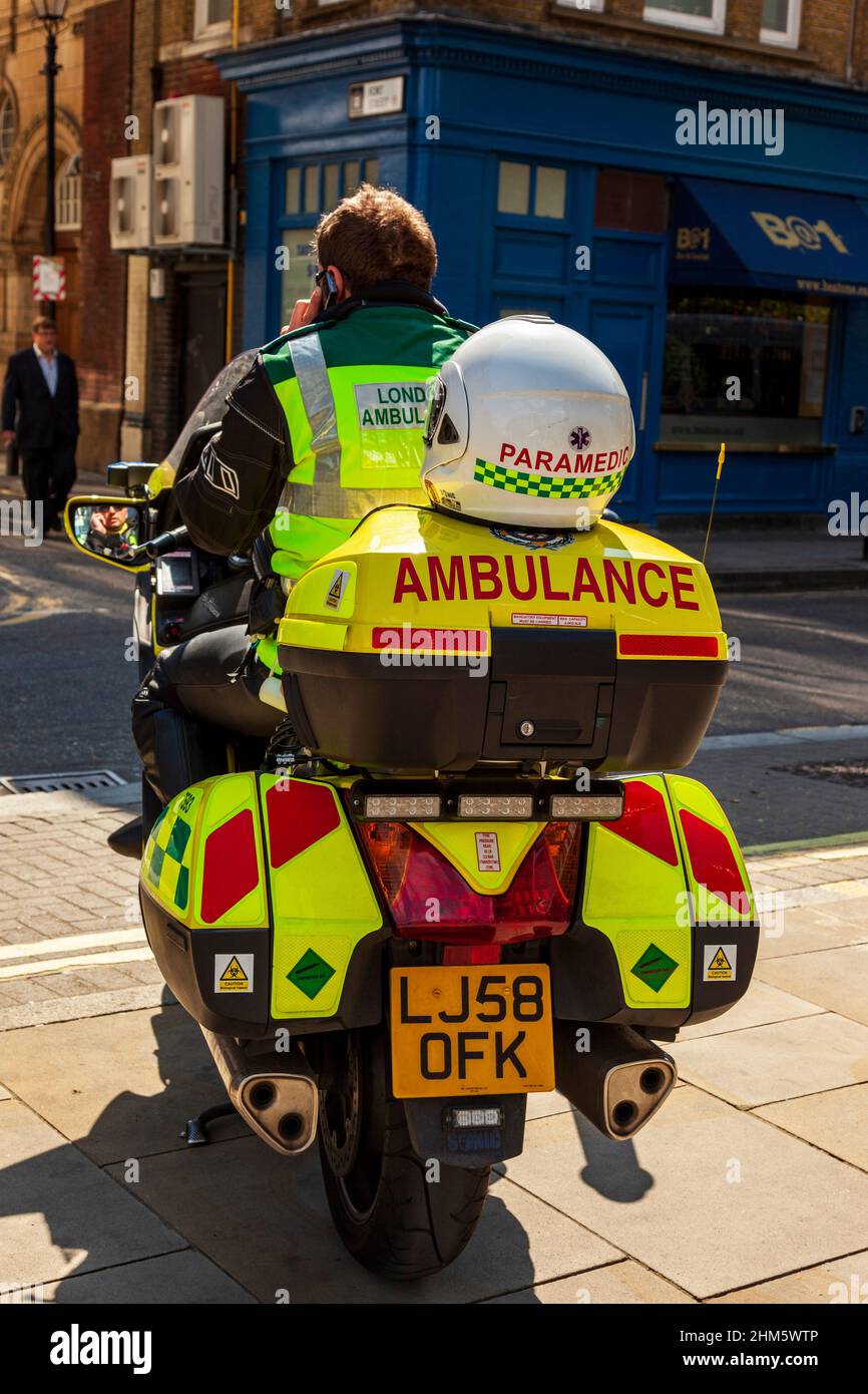 Paramedic on a motorbike, rear view Stock Photo - Alamy