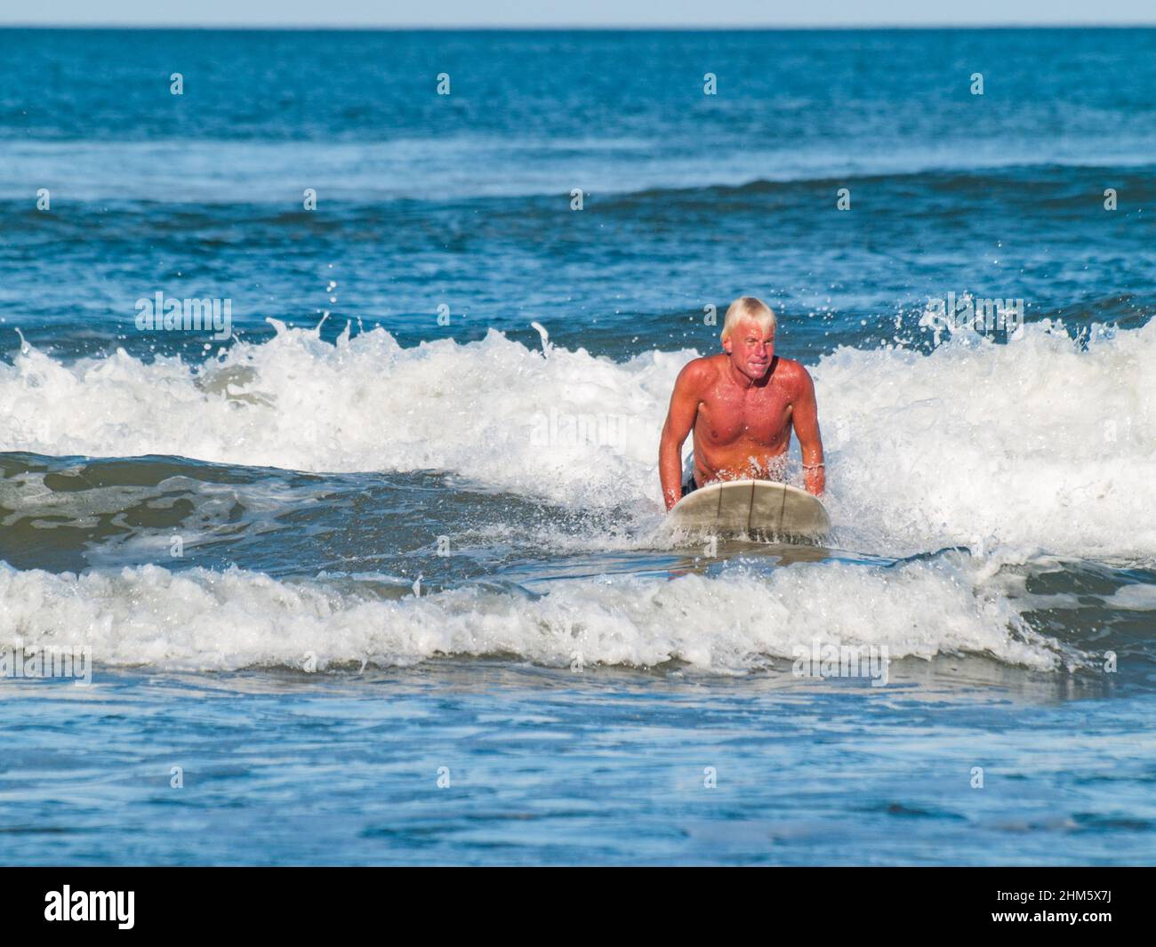 Old Surfer Dude, Tamarindo, Costa Rica Stock Photo - Alamy
