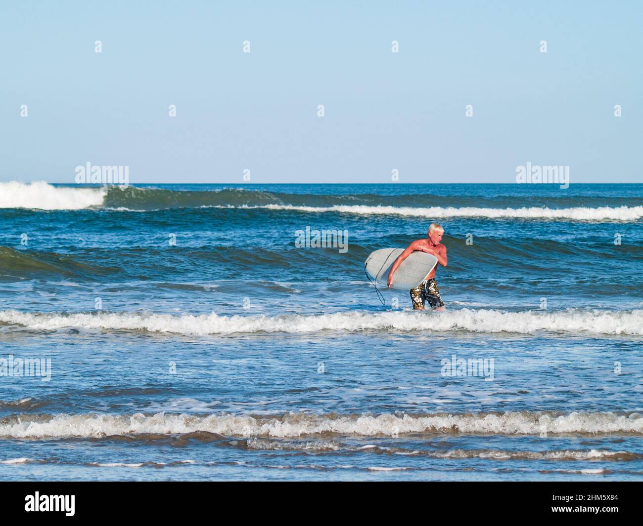 Old Surfer Dude, Tamarindo, Costa Rica Stock Photo - Alamy