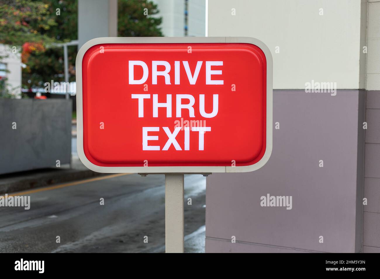Drive Thru exit red sign near fast food restaurant or cafe Stock Photo ...