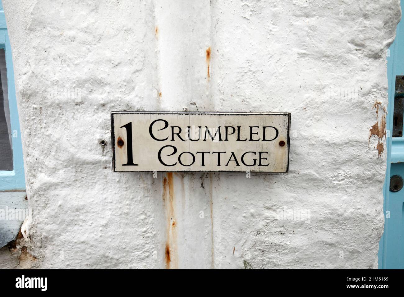 Sign on Crumpled Cottage, number 1. Polperro, Cornwall, UK Stock Photo ...