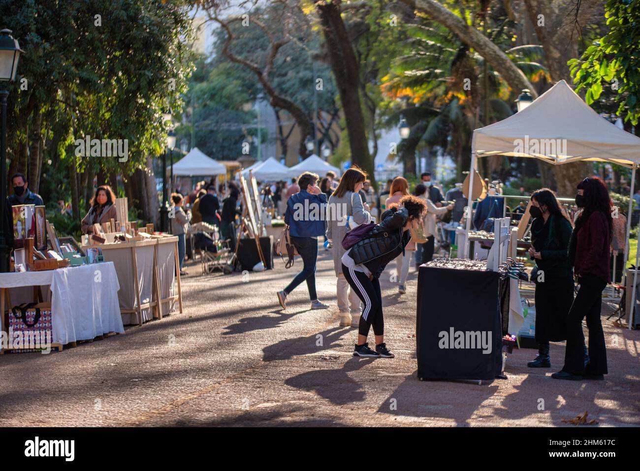 View of crafts and design market in Estrela garden in downtown Lisbon ...