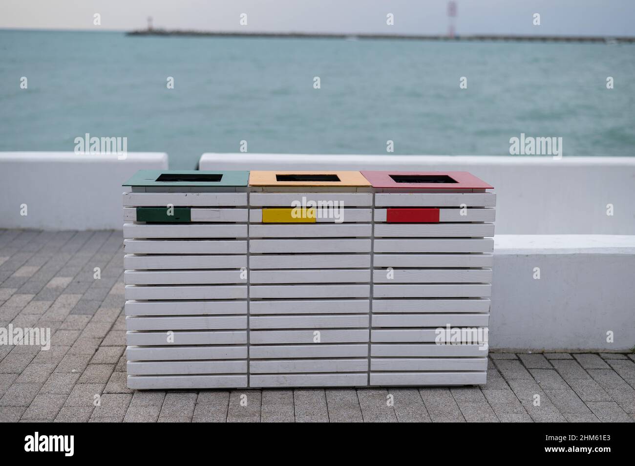 Wooden bins for separate waste on the beach near the sea Stock Photo ...