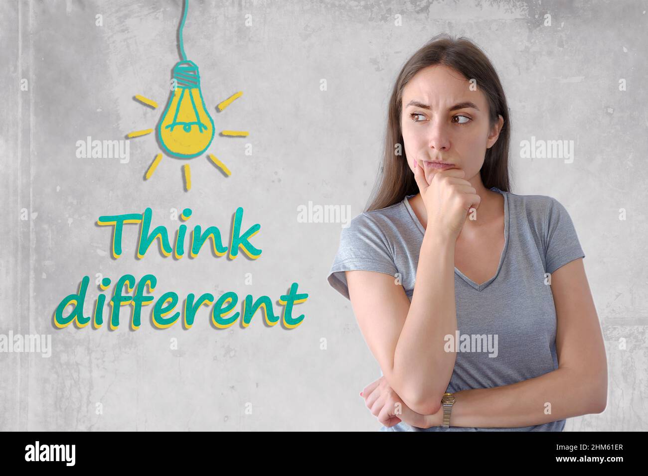 Portrait of wonderful young woman and light bulb for think different ...