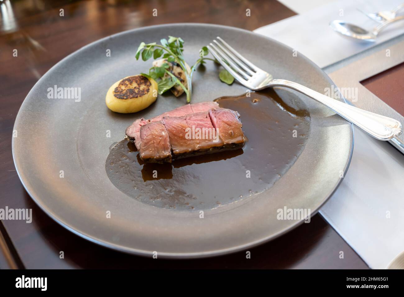 We serve beef fillet in bite size Stock Photo - Alamy