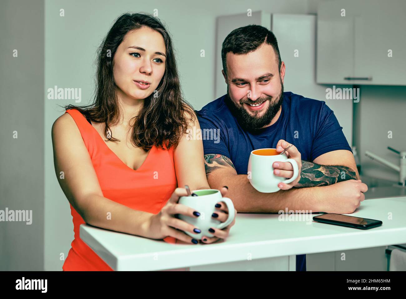 Employees are talking during coffee break in office Stock Photo - Alamy