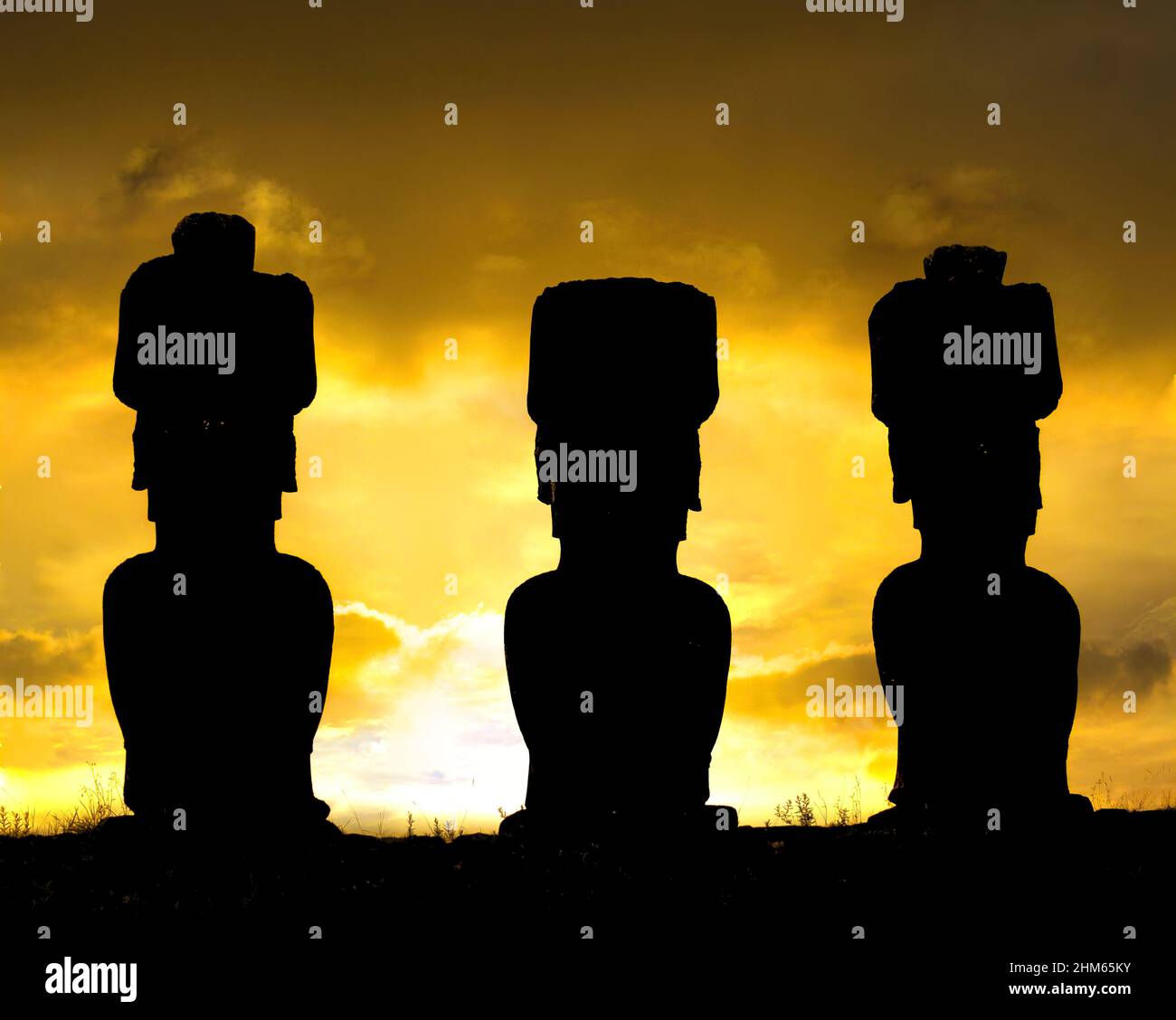 Moai statues in Easter Island illuminated by a dramatic sunset Stock ...