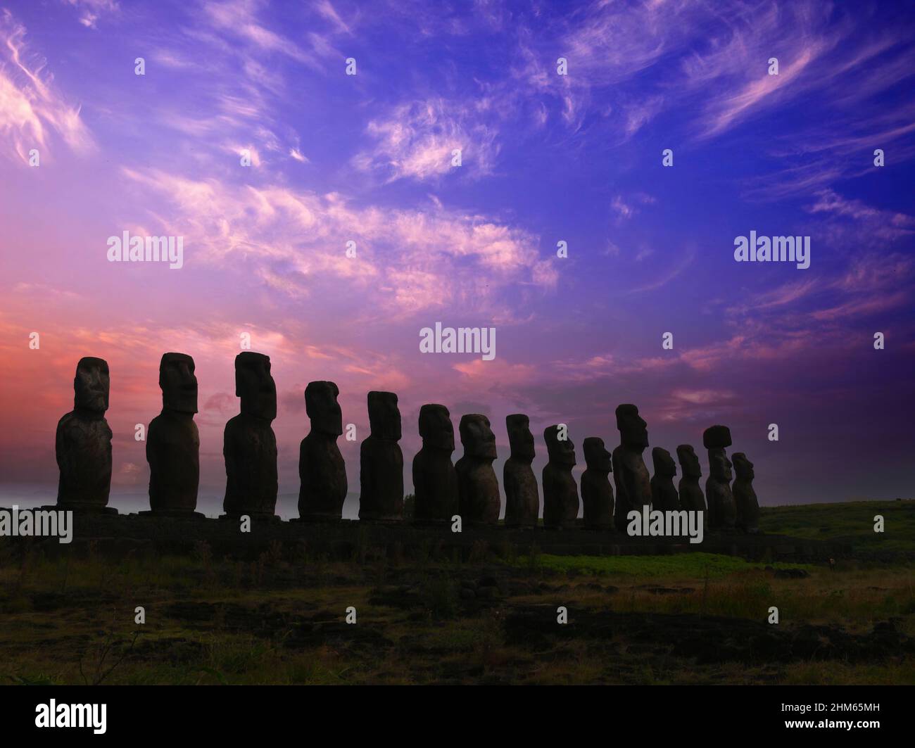 Moai statues in Easter Island illuminated by a dramatic sunset Stock ...