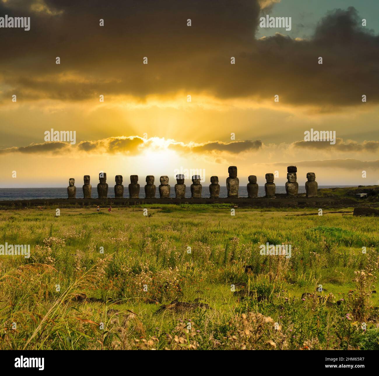 Moai statues in Easter Island illuminated by a dramatic sunset Stock ...