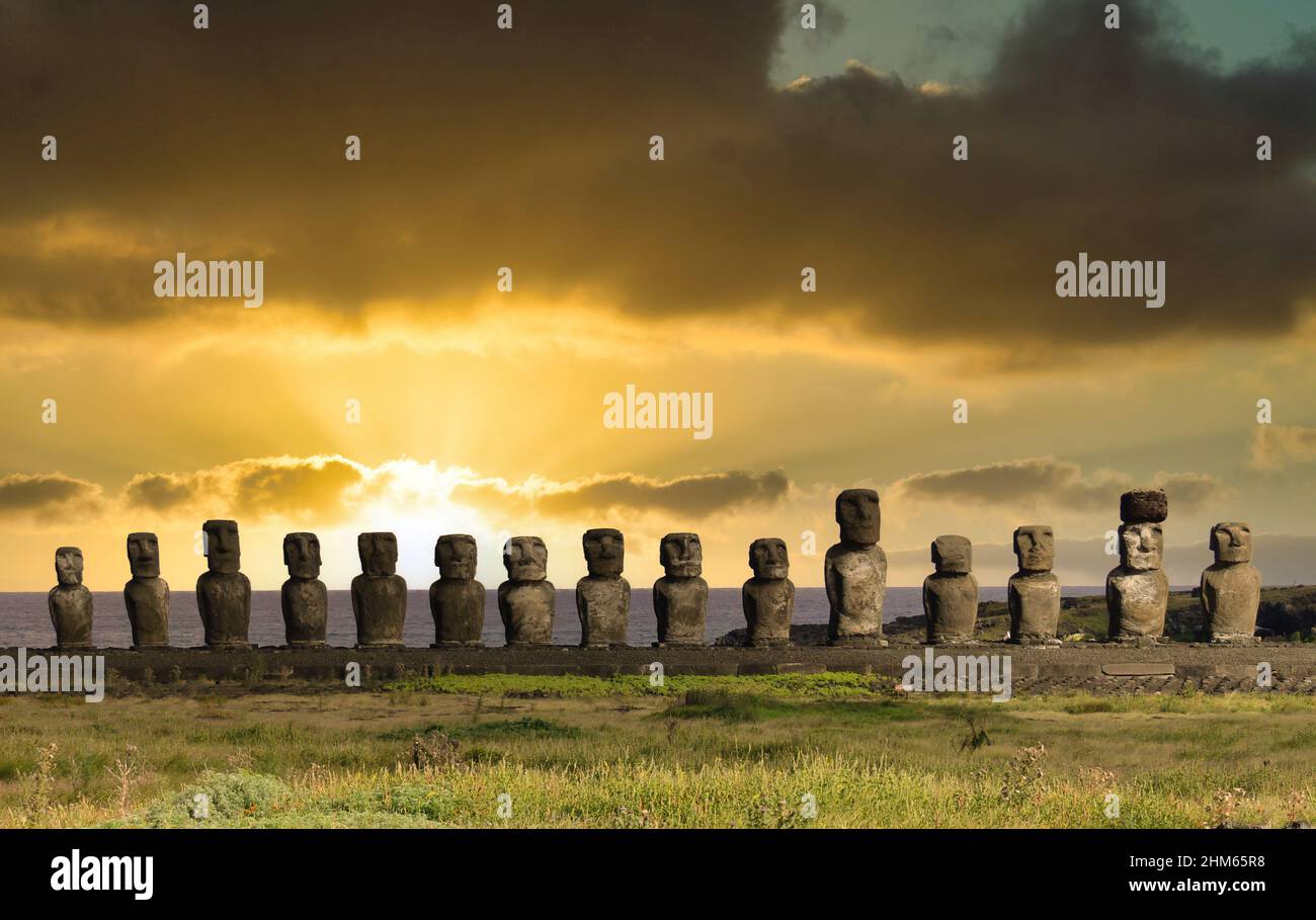 Moai statues in Easter Island illuminated by a dramatic sunset Stock ...