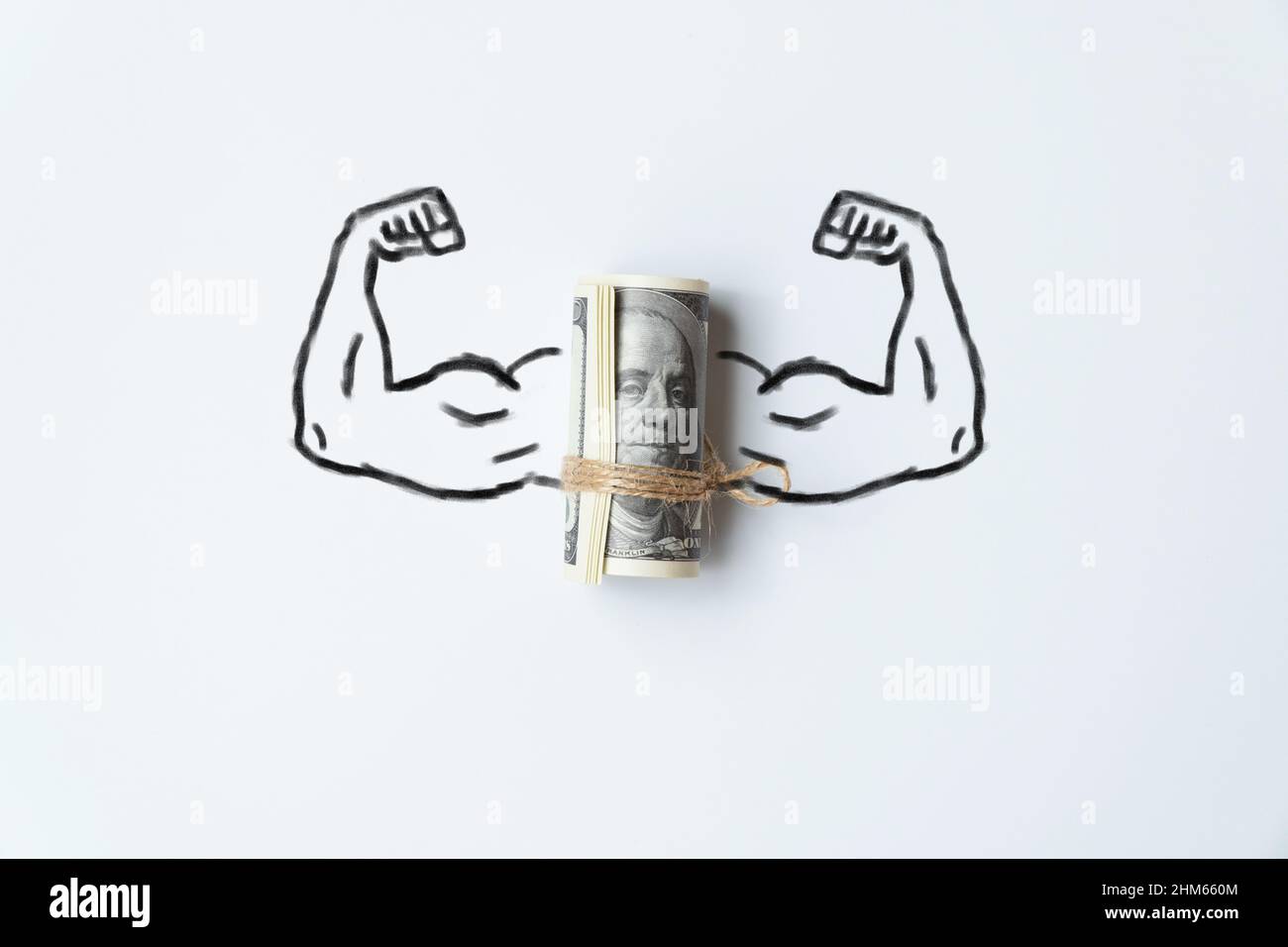 The concept of a strong world currency. Muscle hands with a bunch of us ...