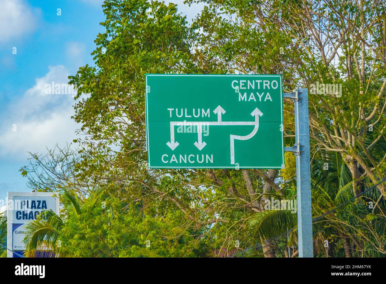 Puerto Aventuras Mexico 02. February 2022 Green turquoise road sign at ...