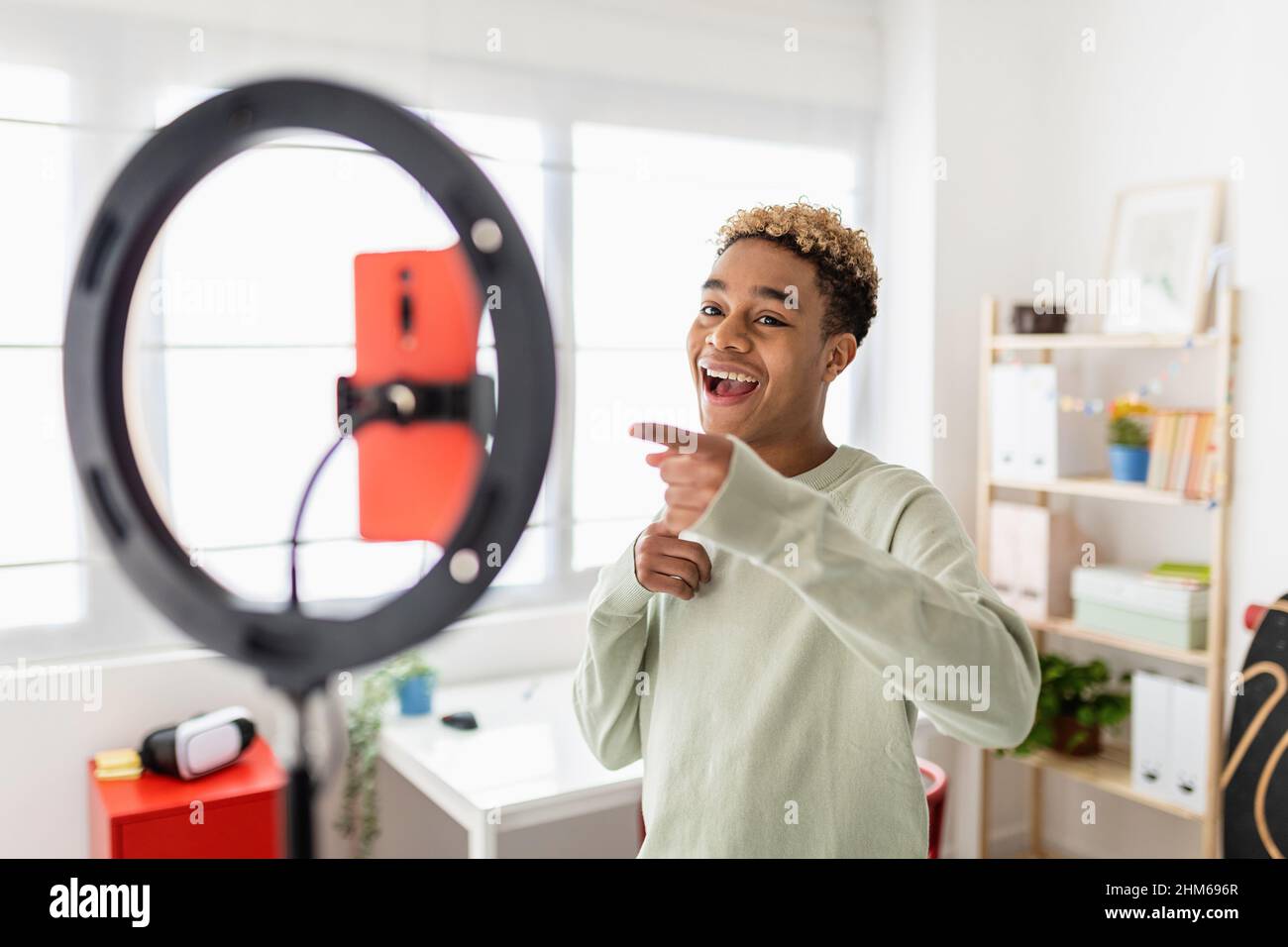 Teen boy video camera hi-res stock photography and images - Alamy