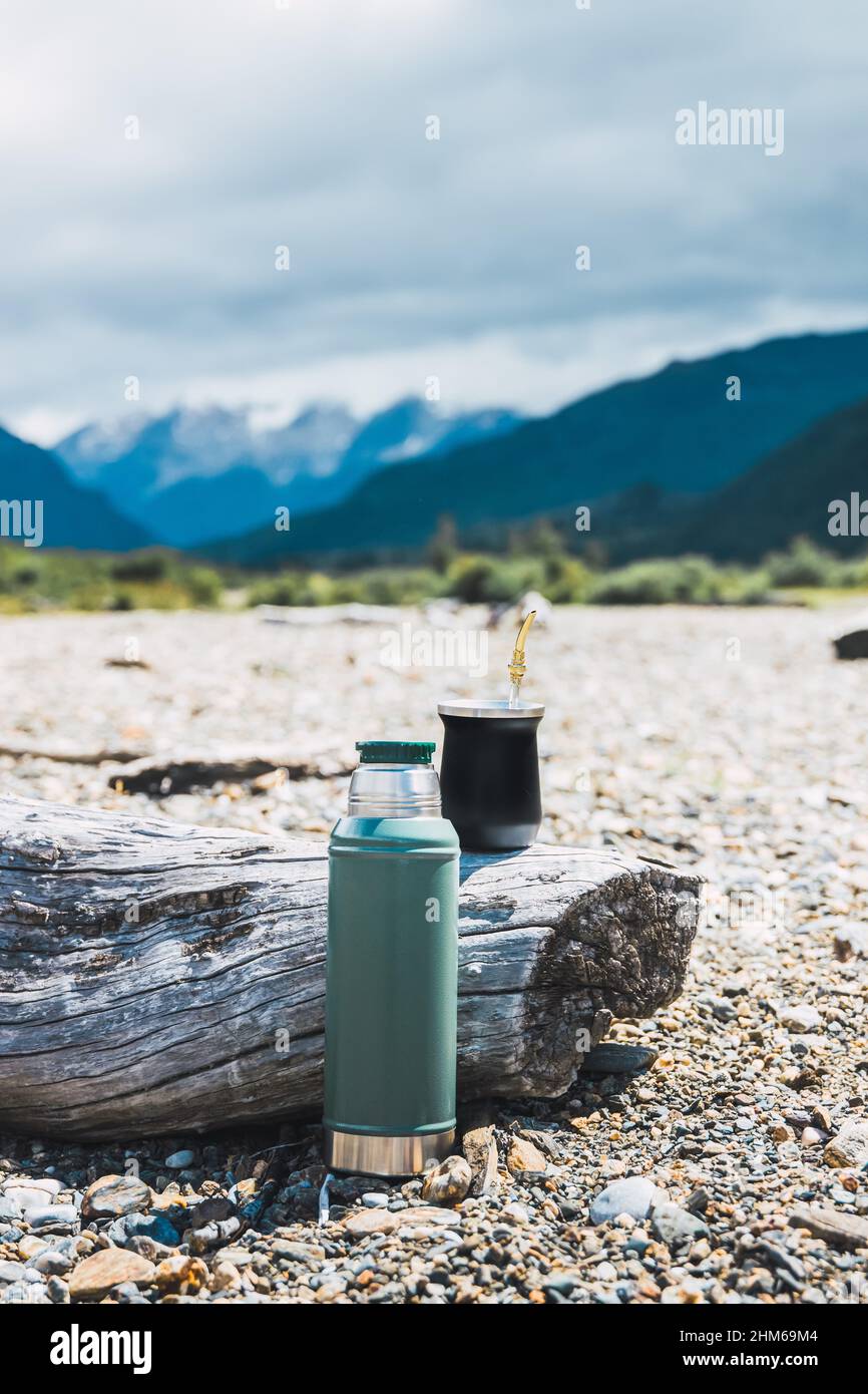 Mate and a thermo full of hot water ready to drink in a natural ...