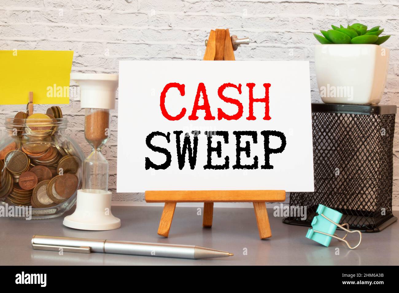 Cash sweep lettering on craft paper, money in the background Stock ...