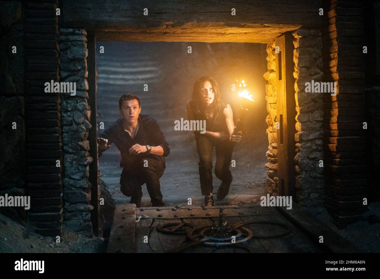 UNCHARTED, from left: Tom Holland, Sophia Ali, 2022. ph: Clay Enos ...