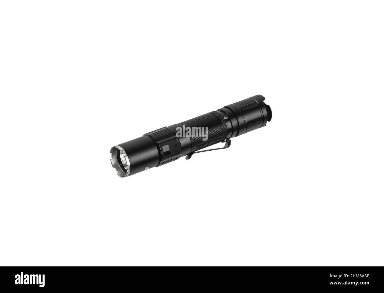 Modern metal LED flashlight. Portable lighting device. Isolate on a ...