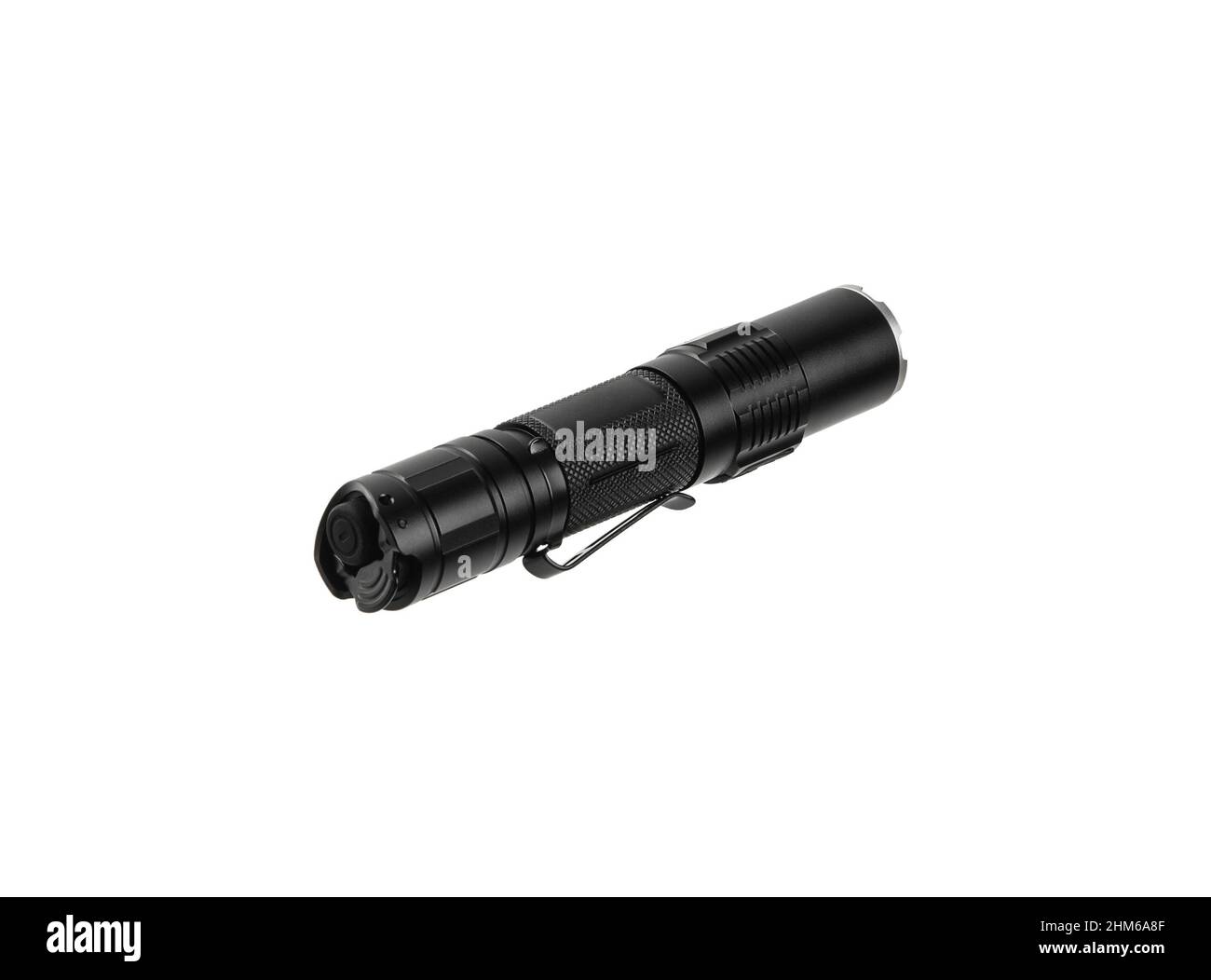 Modern metal LED flashlight. Portable lighting device. Isolate on a ...