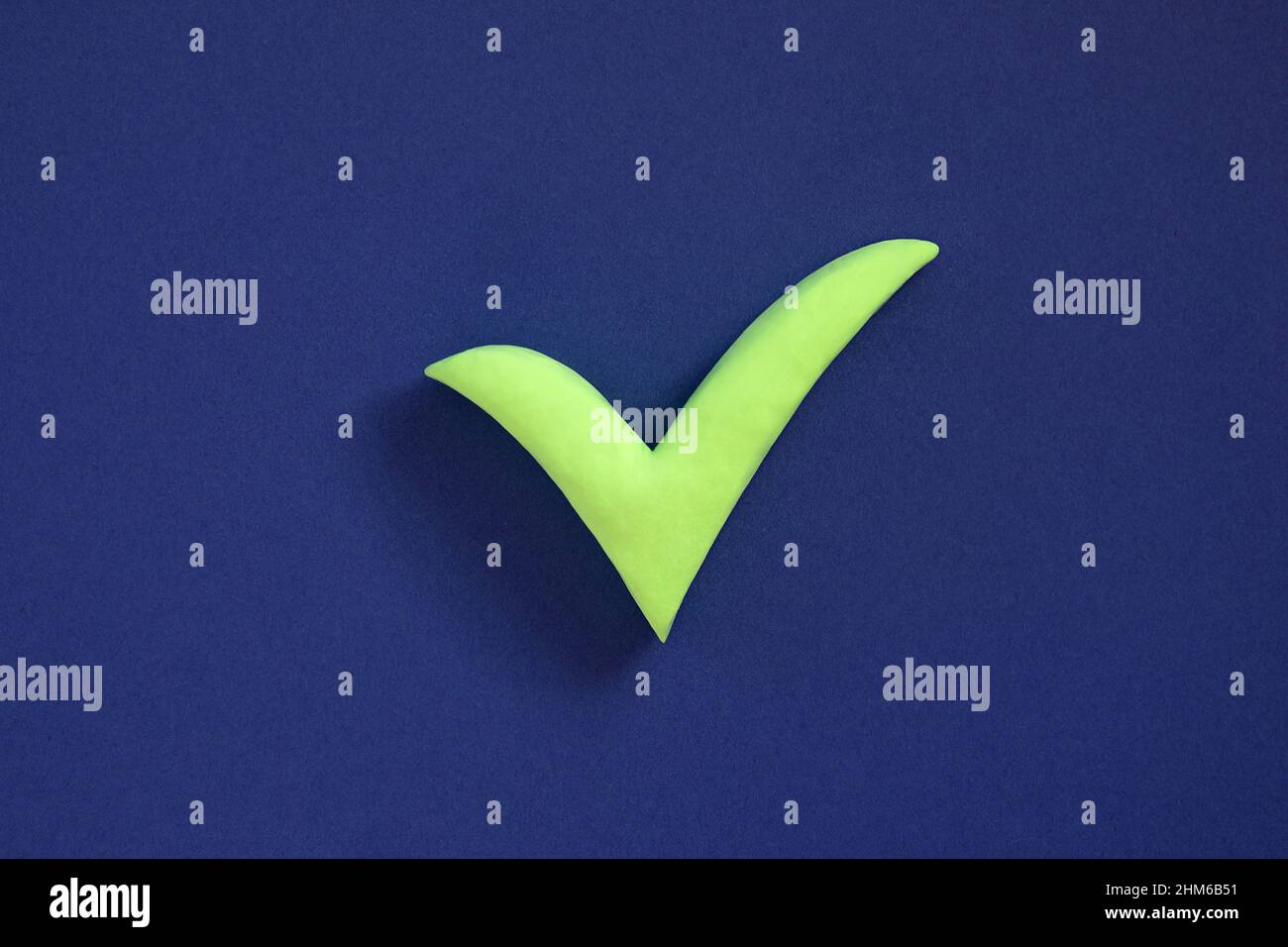 Checkmark sign on blue background. Concept of well done, confirmation ...