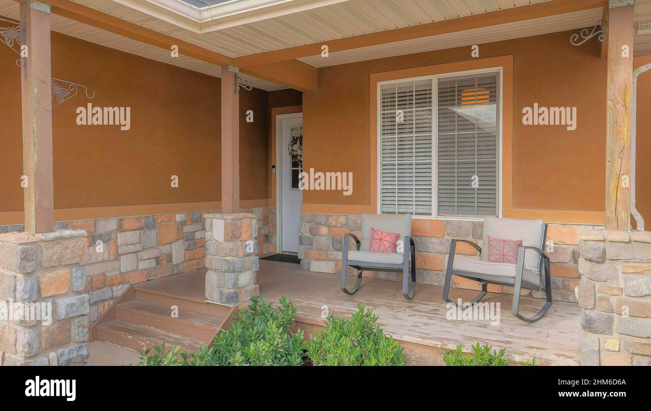 Panorama Orange tan house exterior with stone veneer sidings Stock ...