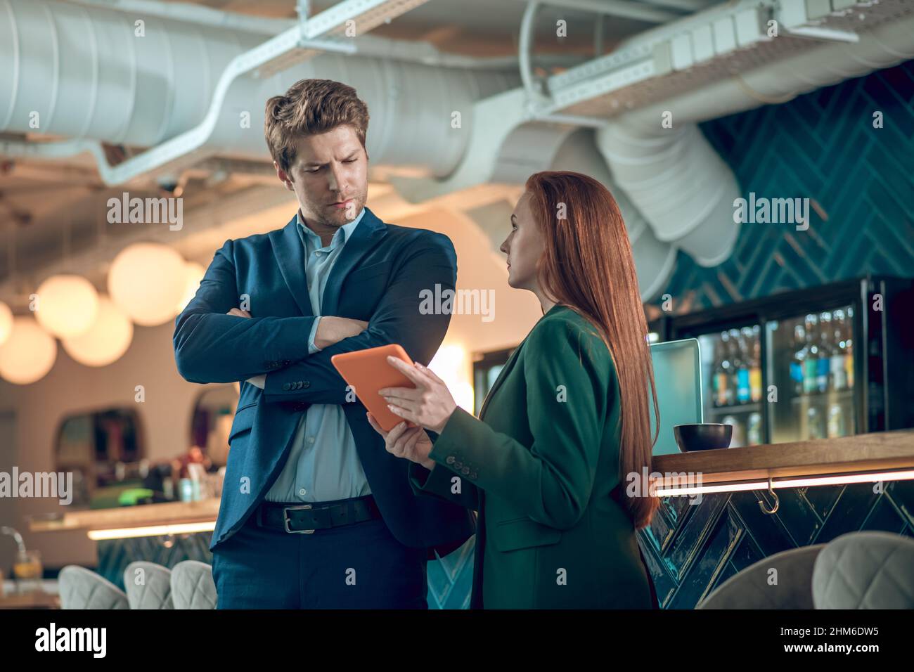 Man standing in cafe hi-res stock photography and images - Alamy