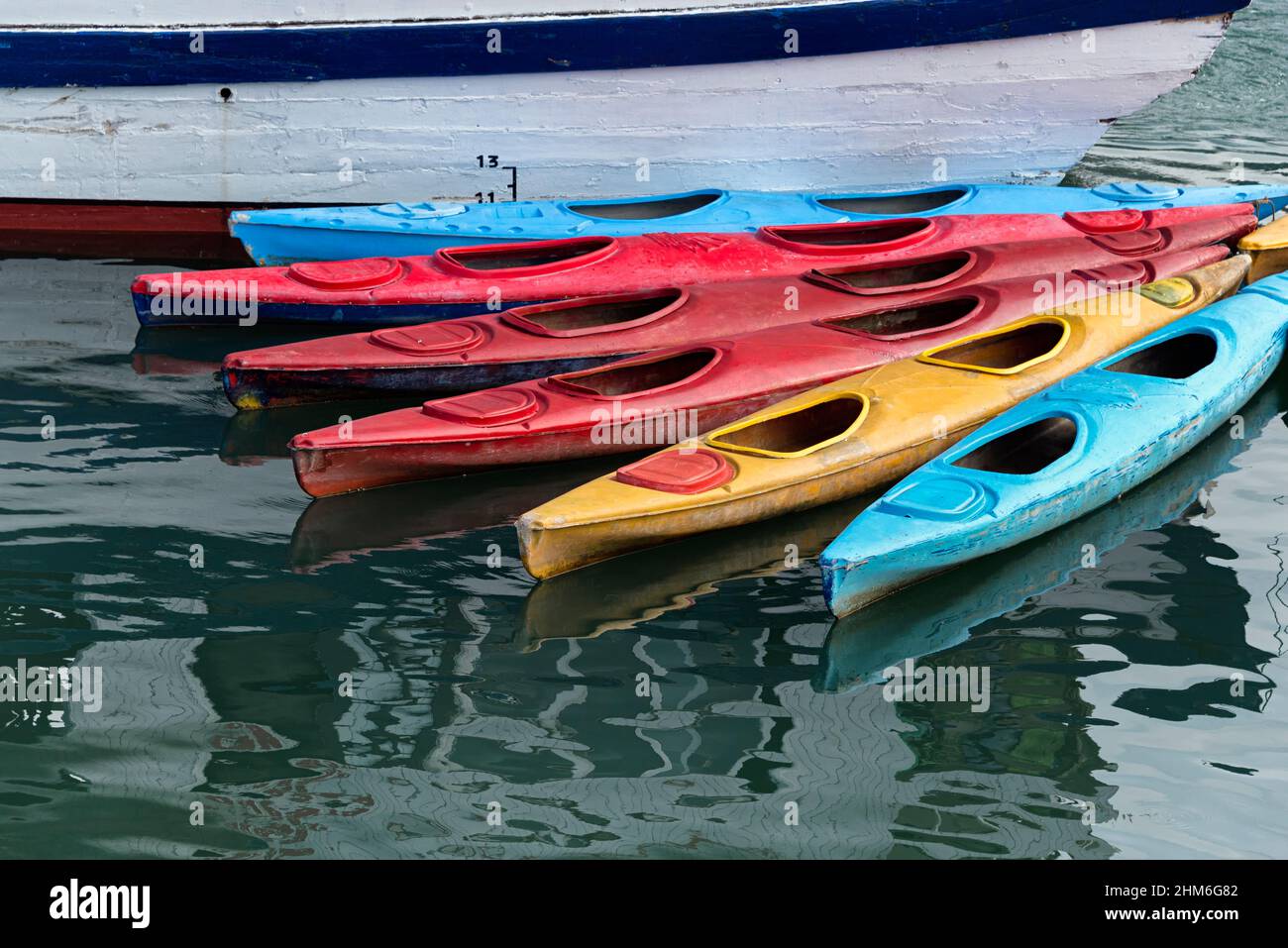 Colourful kayaks on the sea Stock Photo - Alamy