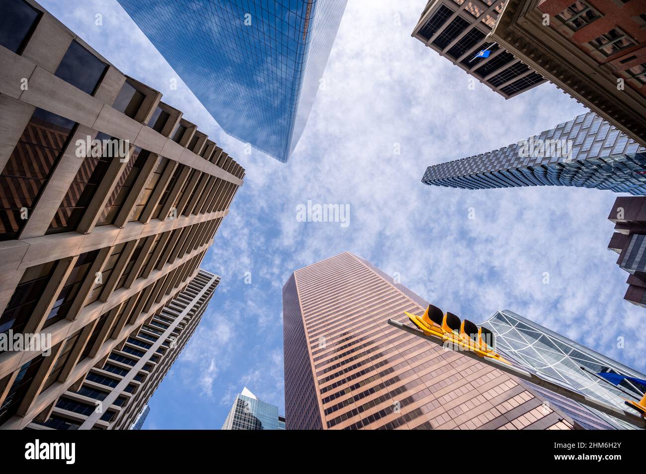 Looking up at skyscrapers in the city of Calgary with Alberta and ...